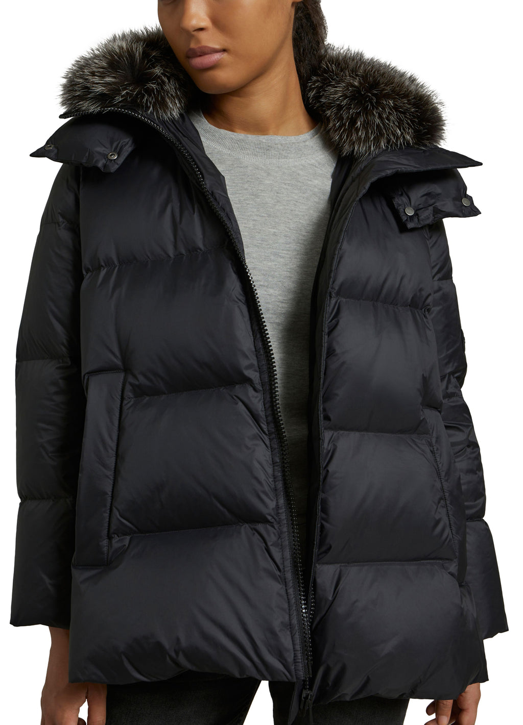 A line down jacket in water-repellent technical fabric with fox fur ...